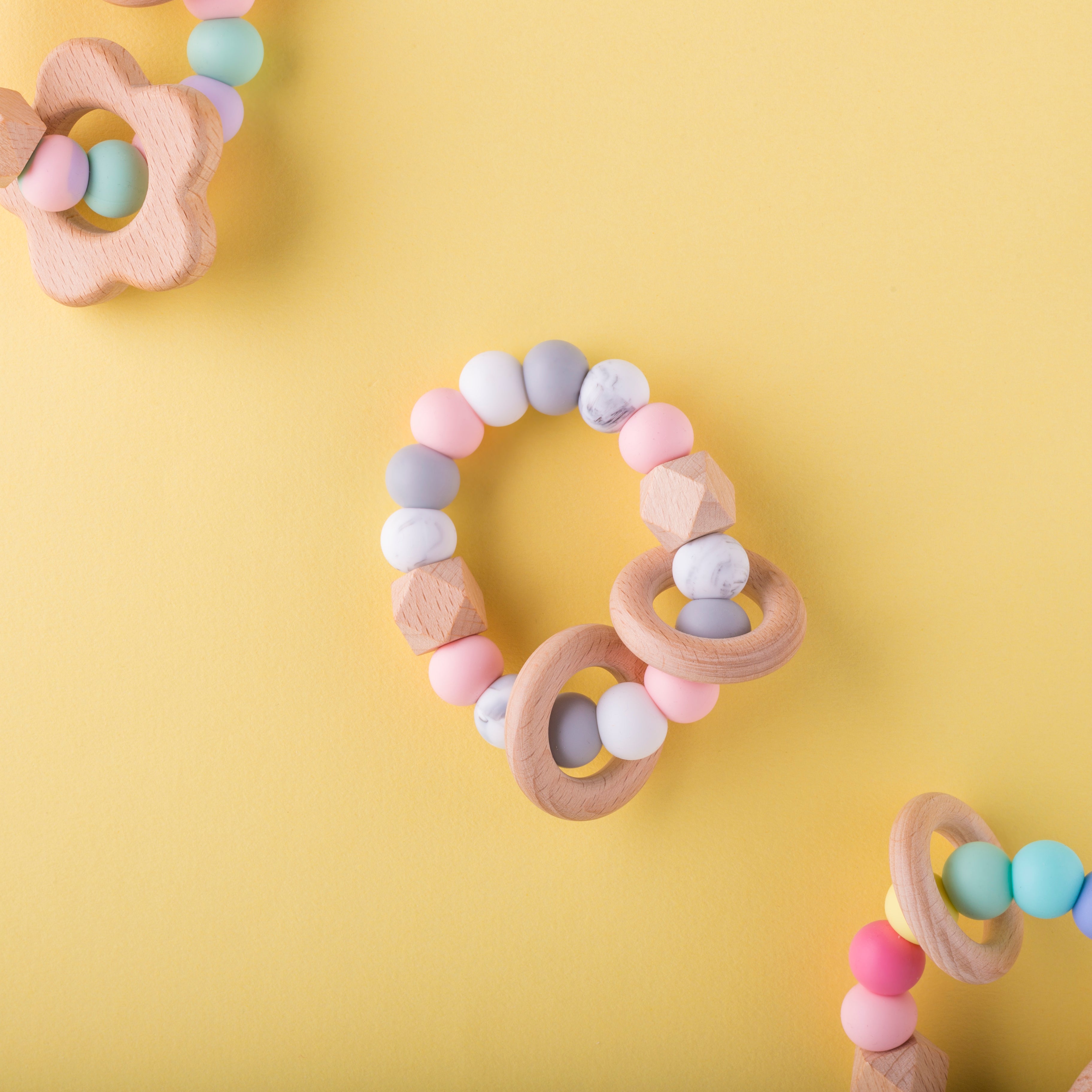 Double rattle teething ring - Girly pink – MunchMonsters